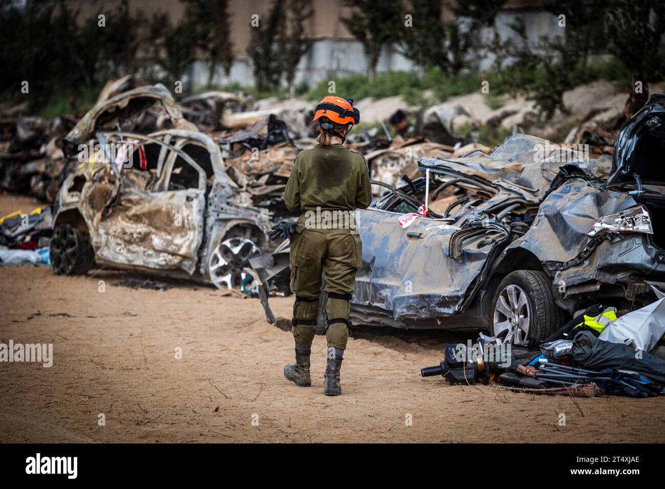 Netivot, Israel. 02nd Nov, 2023. An Israeli army soldier inspects some ...