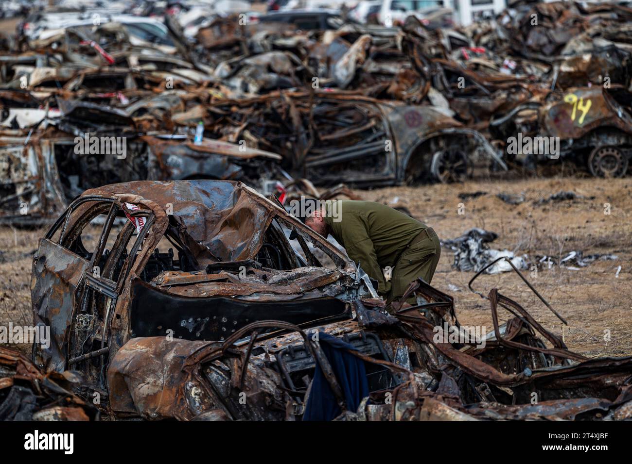 Netivot, Israel. 02nd Nov, 2023. An Israeli army soldier inspects some ...