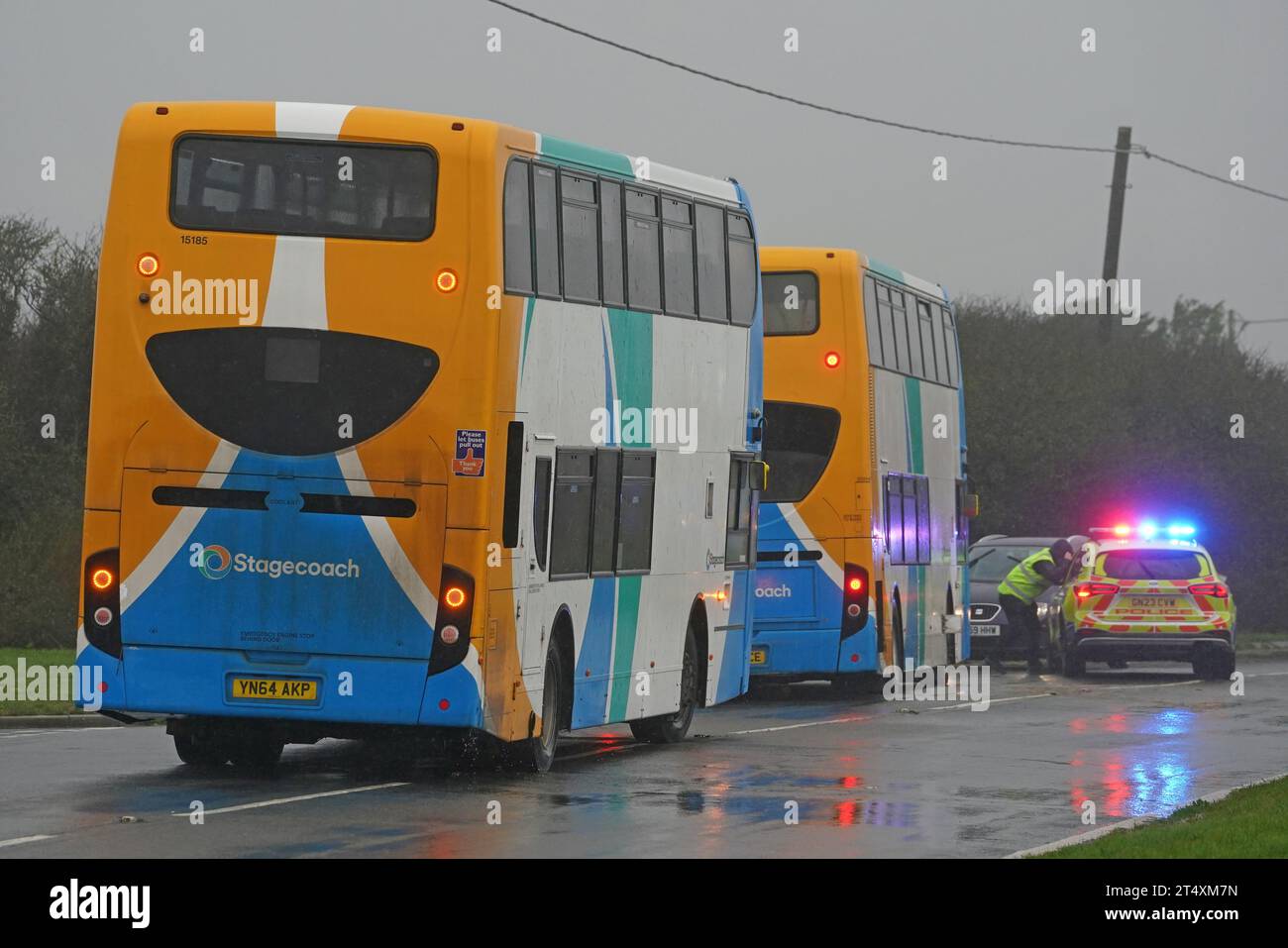 Two stationary buses on a hill in Capel-le-Ferne near Folkestone, Kent ...