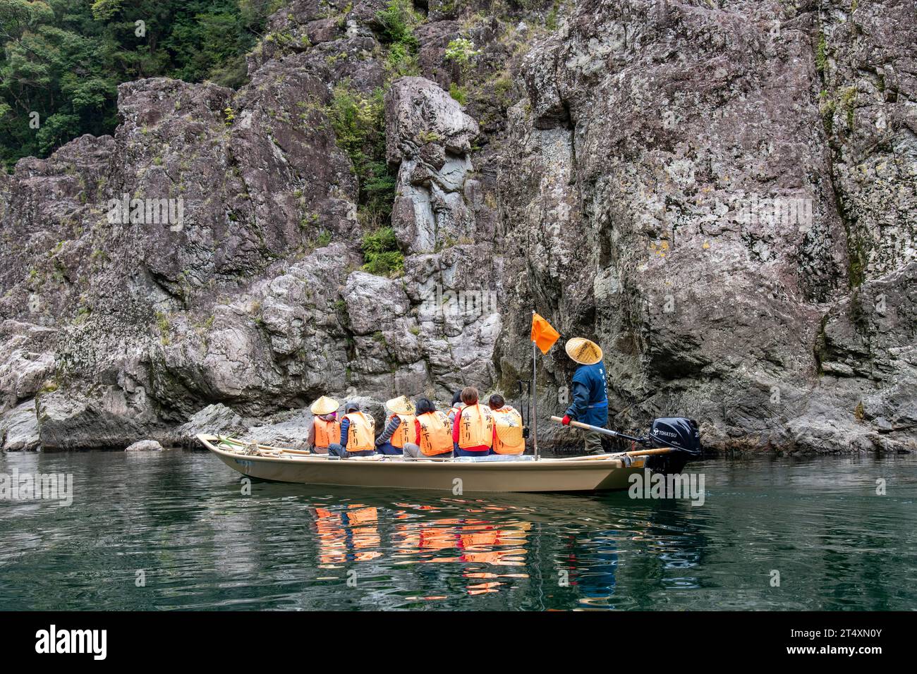 Shingu, Wakayama, Japan-April 5, 2023; Wooden boat along cliffs on ...