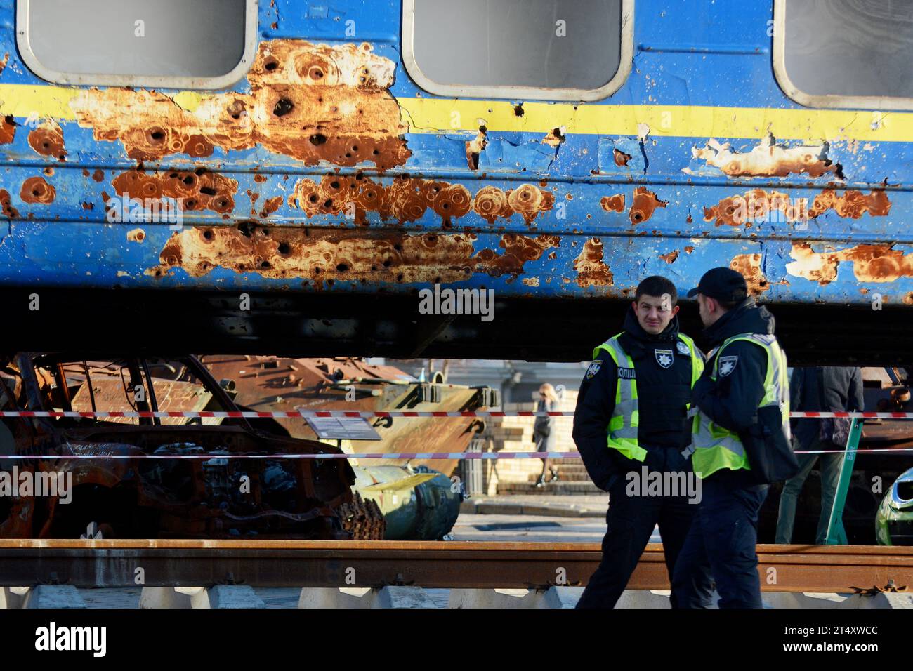 Kyiv, 02/11/2023, Two police officers stand next to train carriage that ...