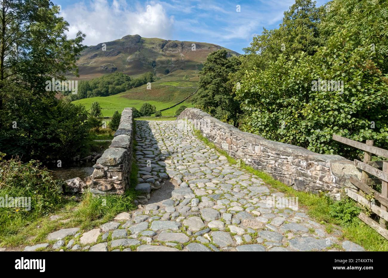 New Bridge across River Derwent on the Cumbria Way in summer Rosthwaite ...
