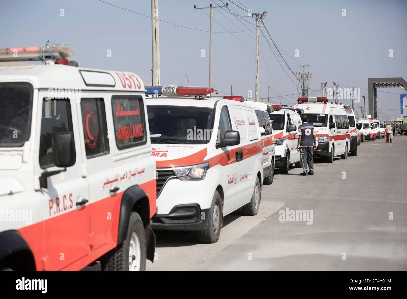 Palestinian health ministry ambulances arrive outside the Rafah border ...