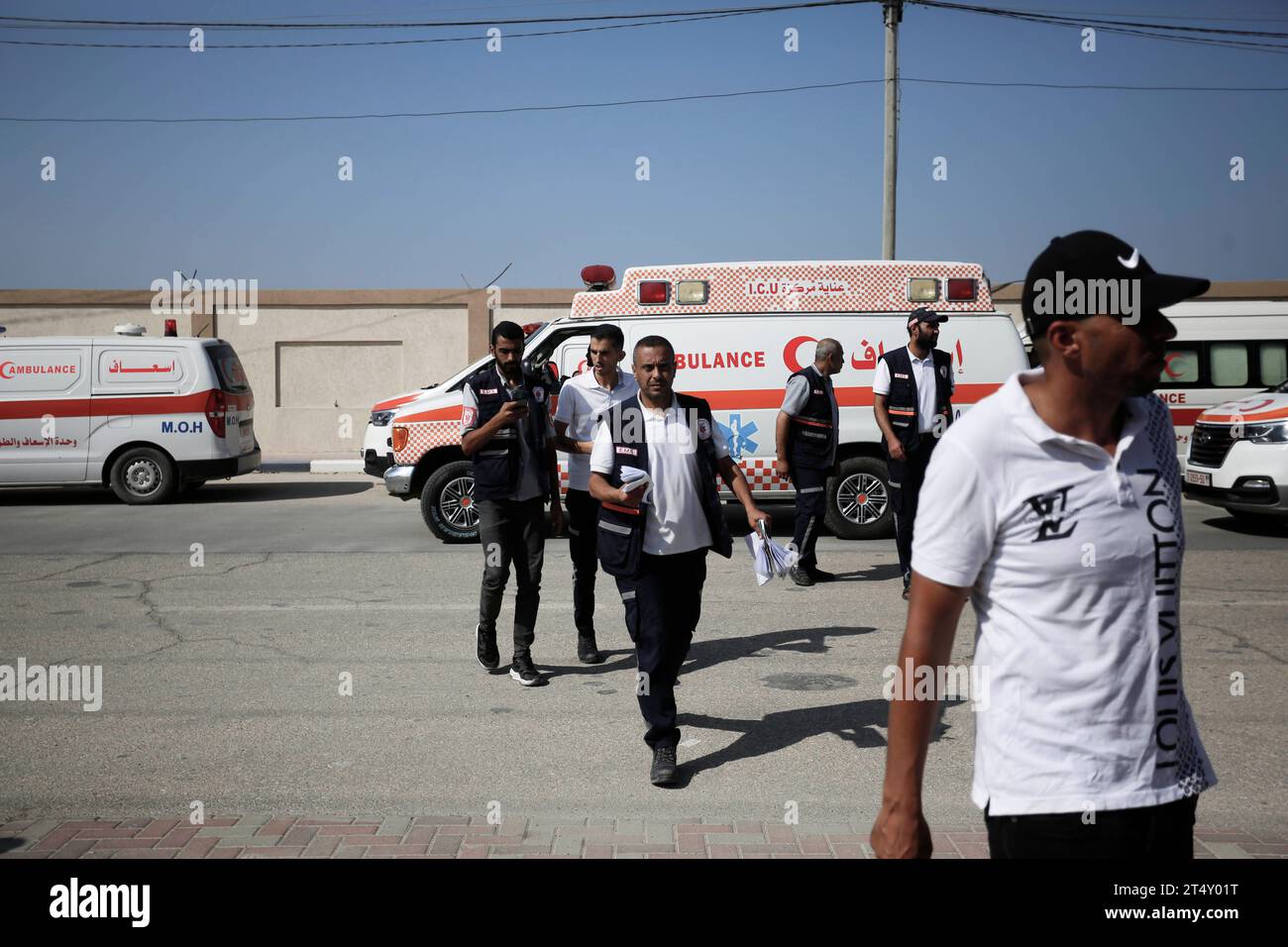 Palestinian health ministry ambulances arrive outside the Rafah border ...