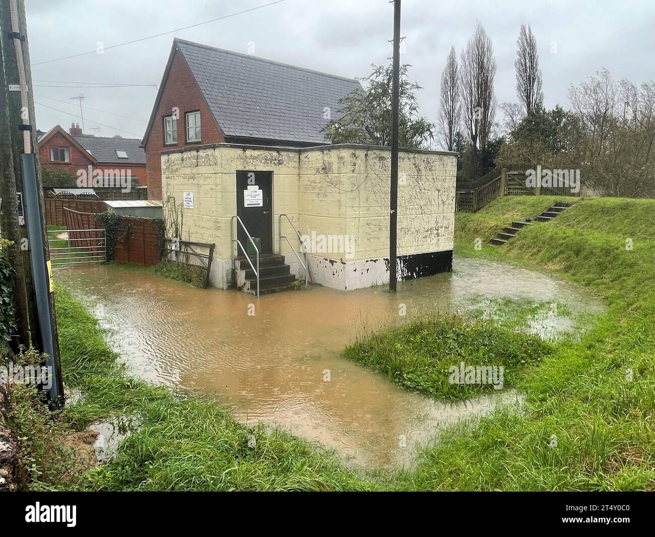 Flood water surrounds the pumping station in Clyst Saint Mary, near ...