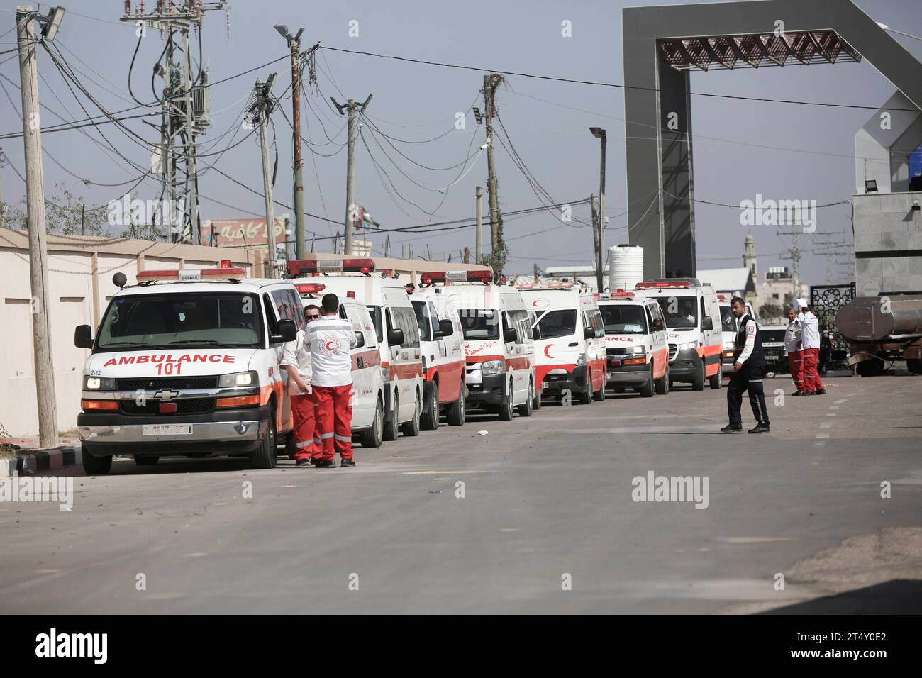 Palestinian health ministry ambulances arrive outside the Rafah border ...