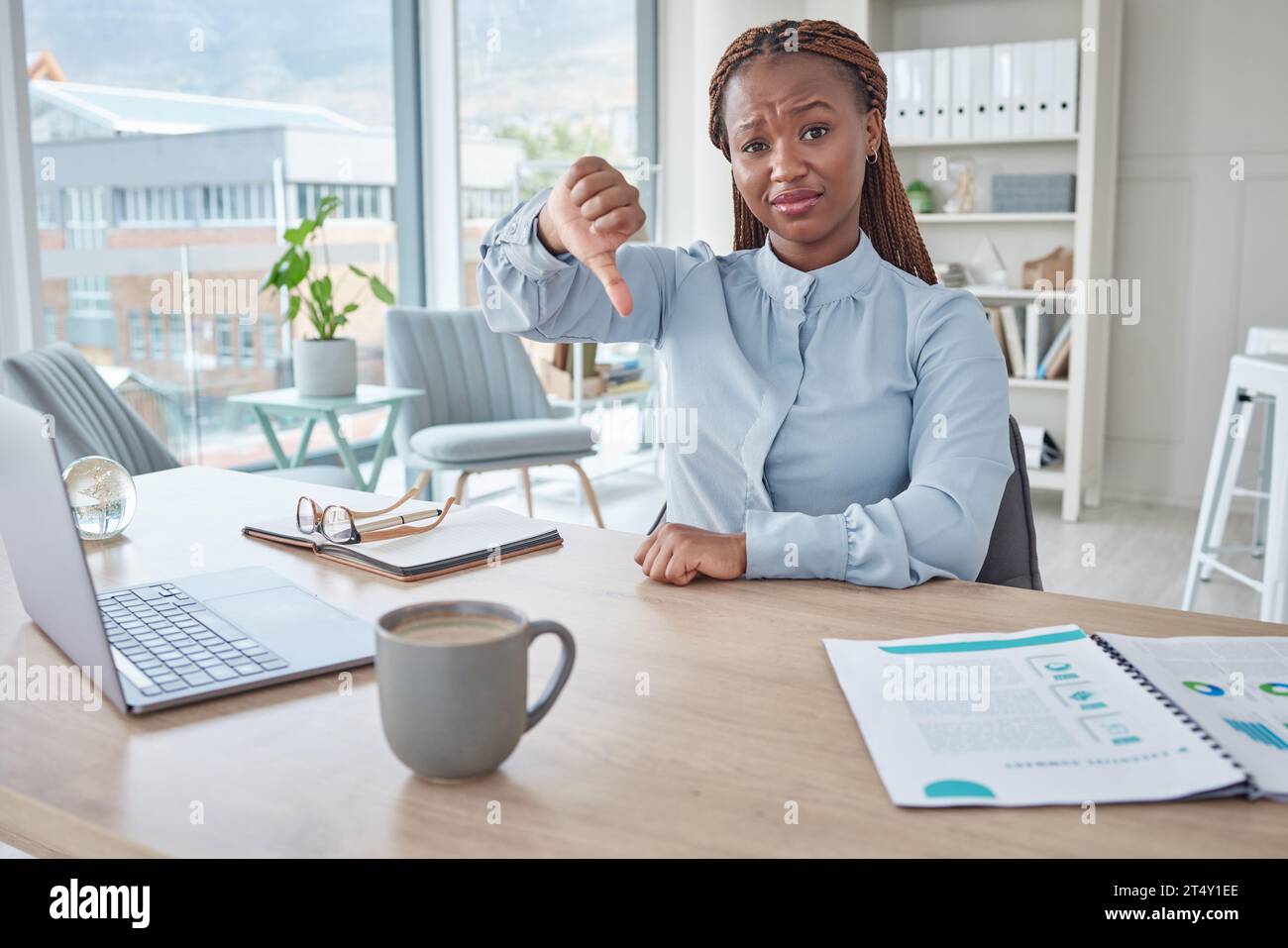 Thumbs down, negative and fail with a business woman denying, declining ...