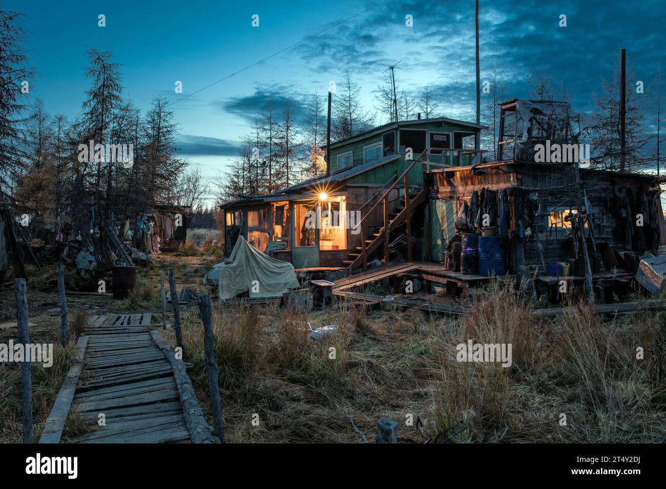 Hunter's hut at dusk, Duwanni Jar, Yakutia, Russia Stock Photo - Alamy
