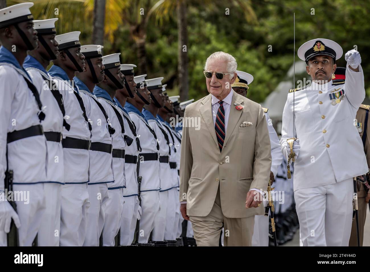 Britain's King Charles III, 2nd right, inspects the guard of honor on a ...