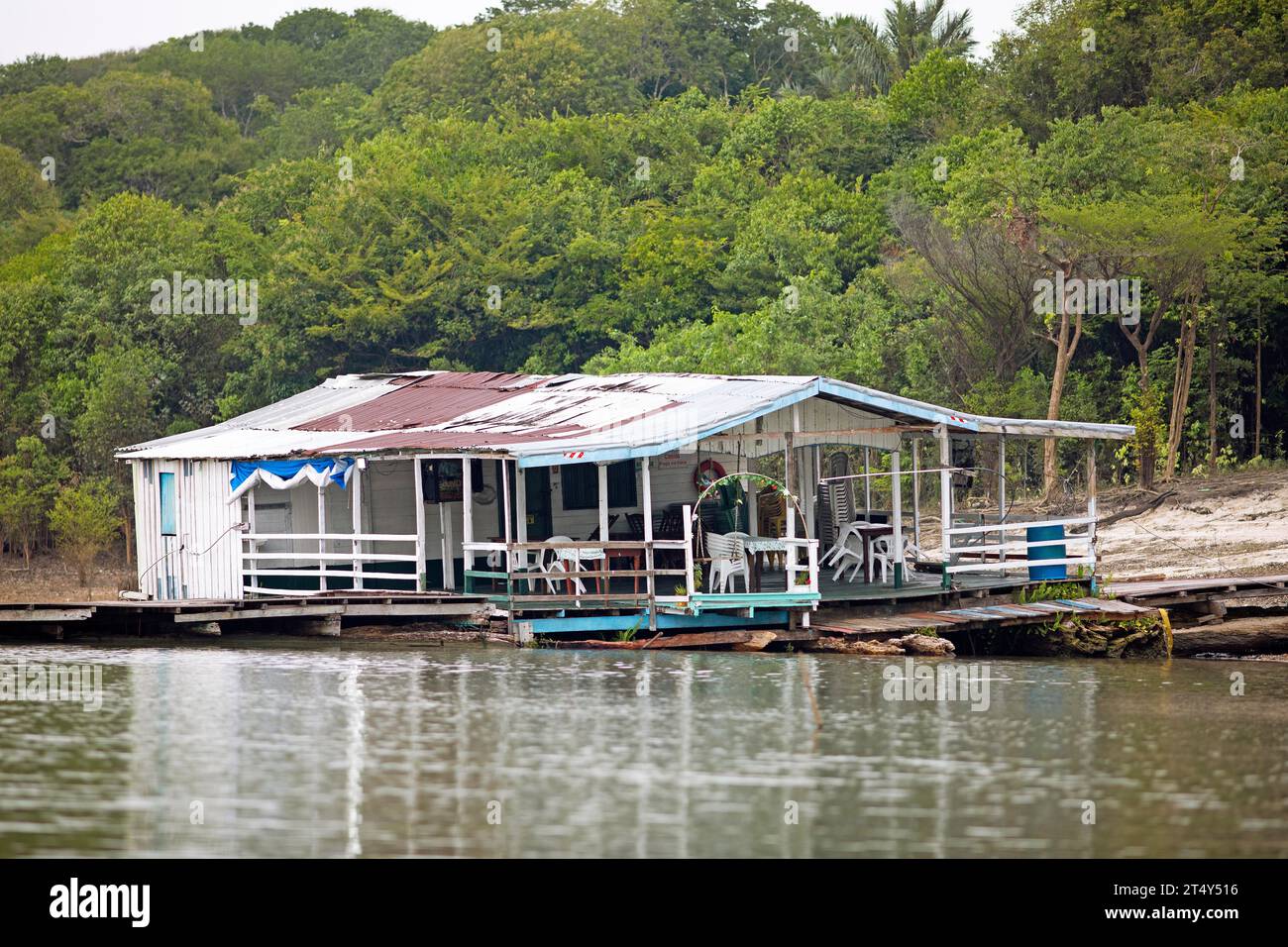 Floating house on the Rio Amazonas at low water level, Manaus, State of ...