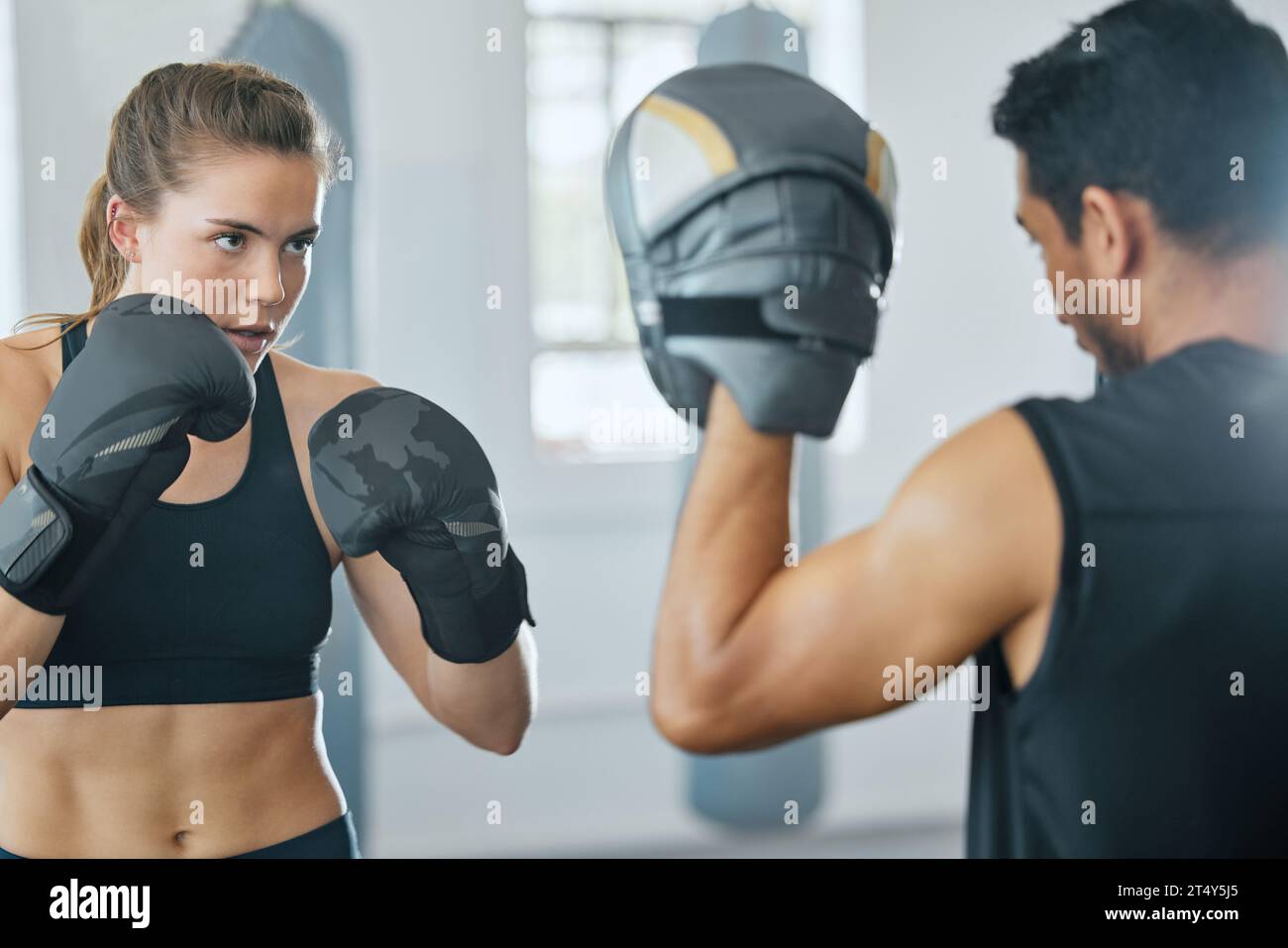 Female boxer practicing coach hi-res stock photography and images - Alamy