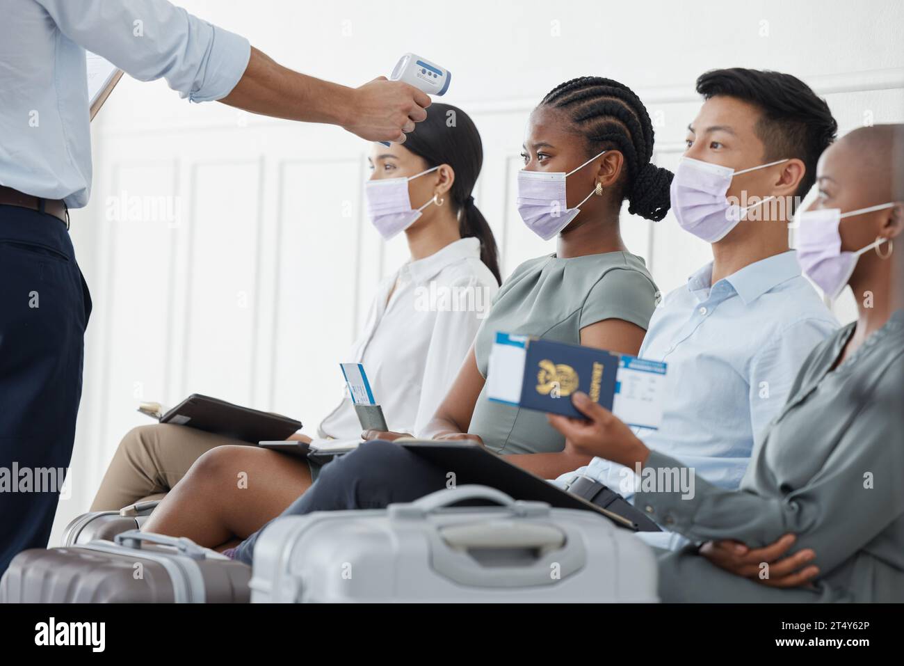 Covid, travel and business people at the airport with thermometer doing ...