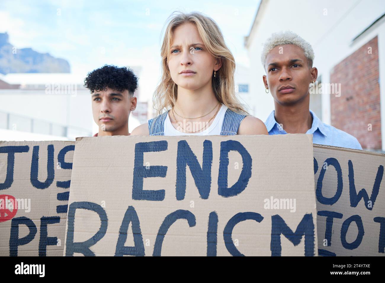 Diverse group of adults fighting hi-res stock photography and images ...