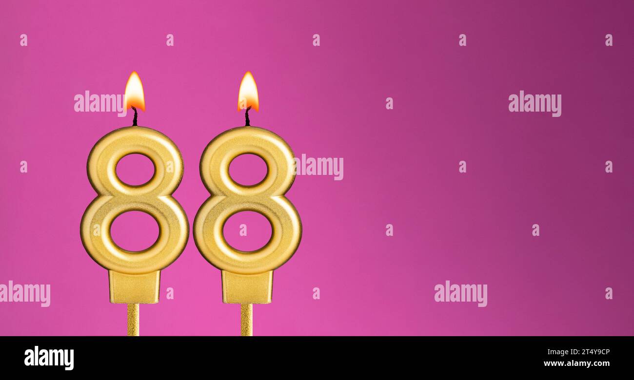 Birthday card with candle number 88 - purple background Stock Photo - Alamy