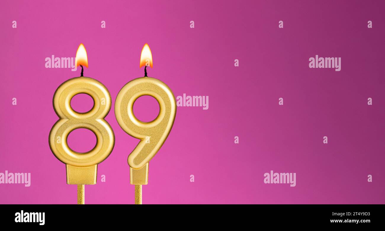 Candle number 89 in purple background - birthday card Stock Photo - Alamy