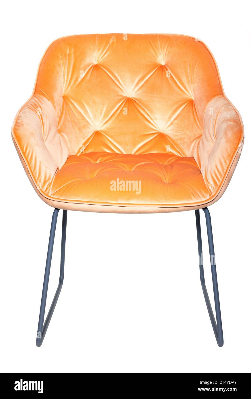 Comfortable velour orange chair with soft quilted upholstery on a white ...