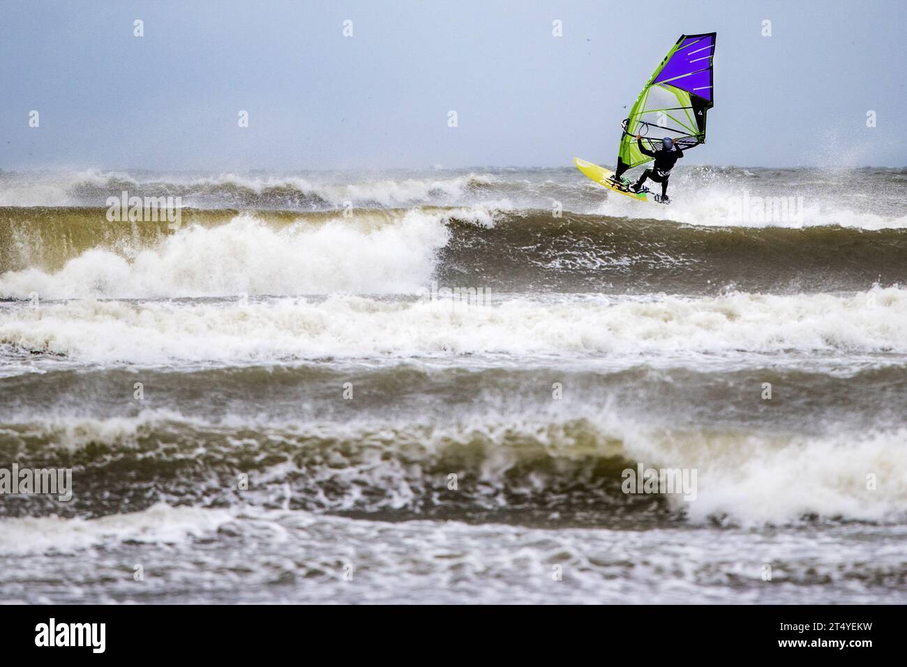 WIJK aan ZEE - Windsurfers on the coast of Wijk aan Zee. Storm Ciaran ...
