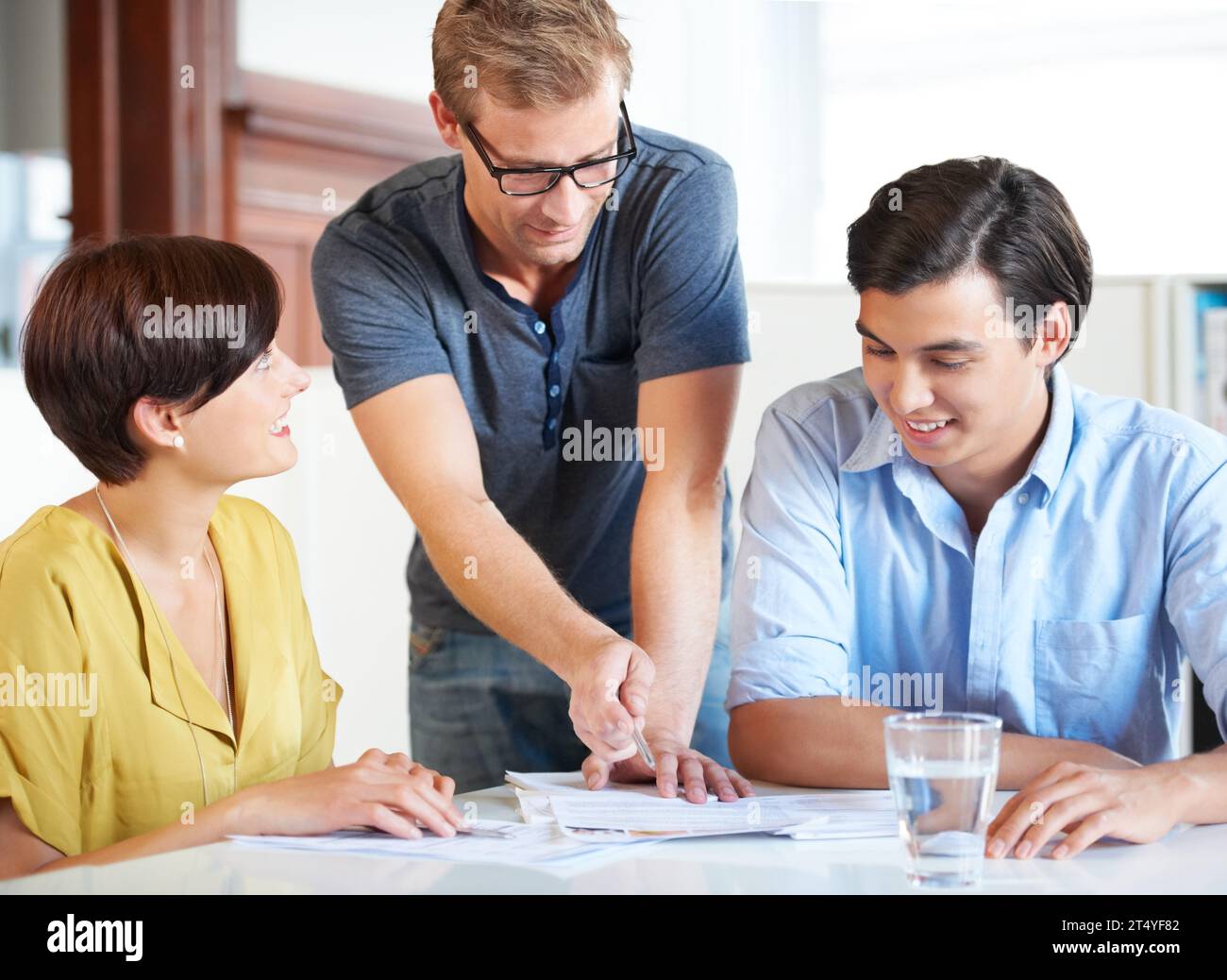 Business meeting, team and documents for research, planning or ...