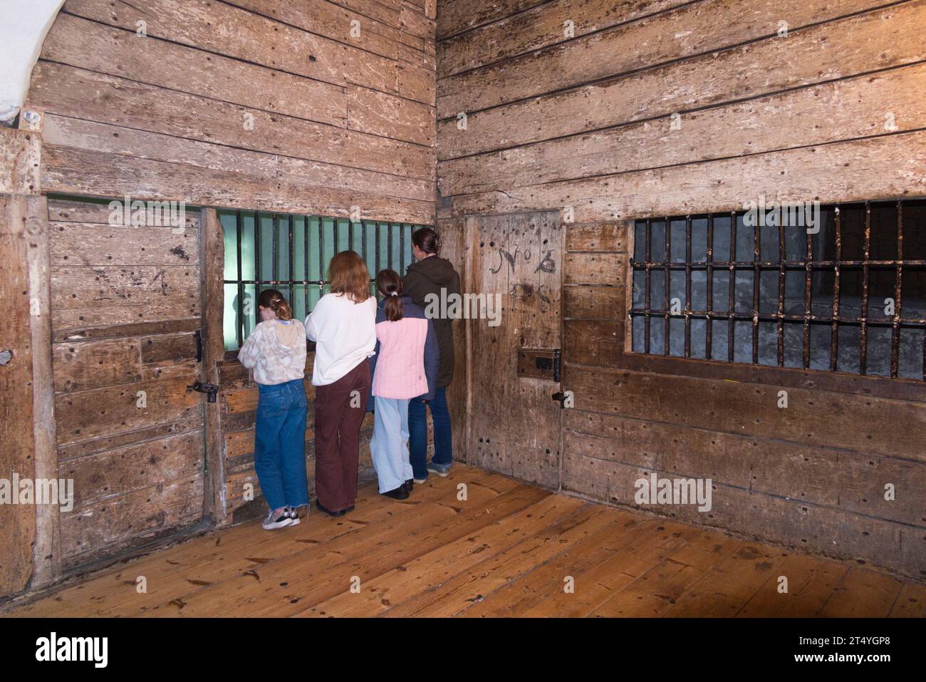 Castle prison, or gaol. Visitor tourist family learn about how women ...