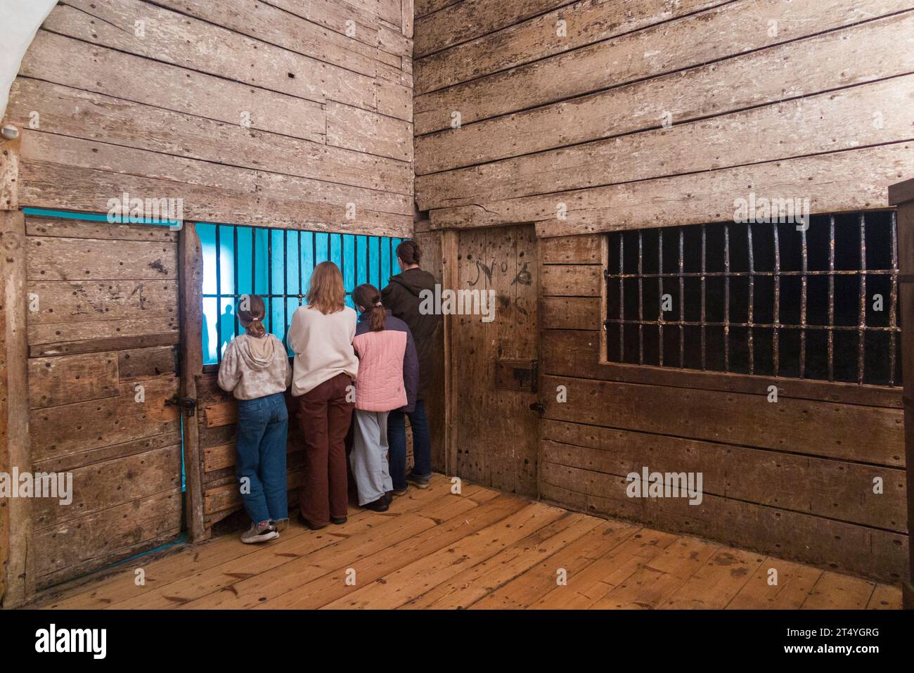 Castle prison, or gaol. Visitor tourist family learn about how women ...
