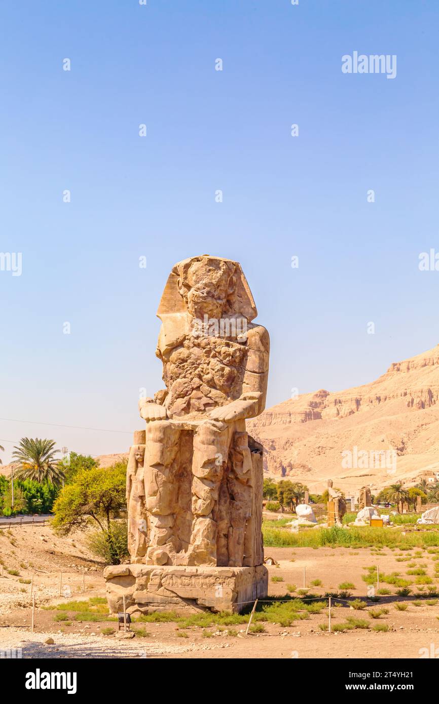 Famous Colossi of Memnon - massive ruined statues of the Pharaoh ...