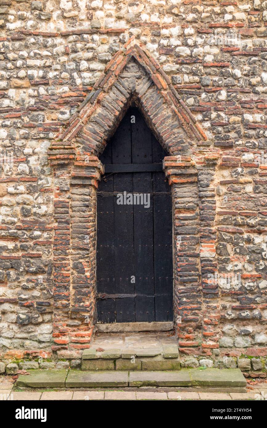 Holy Trinity Saxon church Colchester town centre; west door in late ...