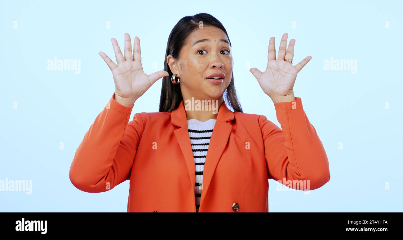 Portrait, warning and woman with stop, rejection and reaction on a blue ...