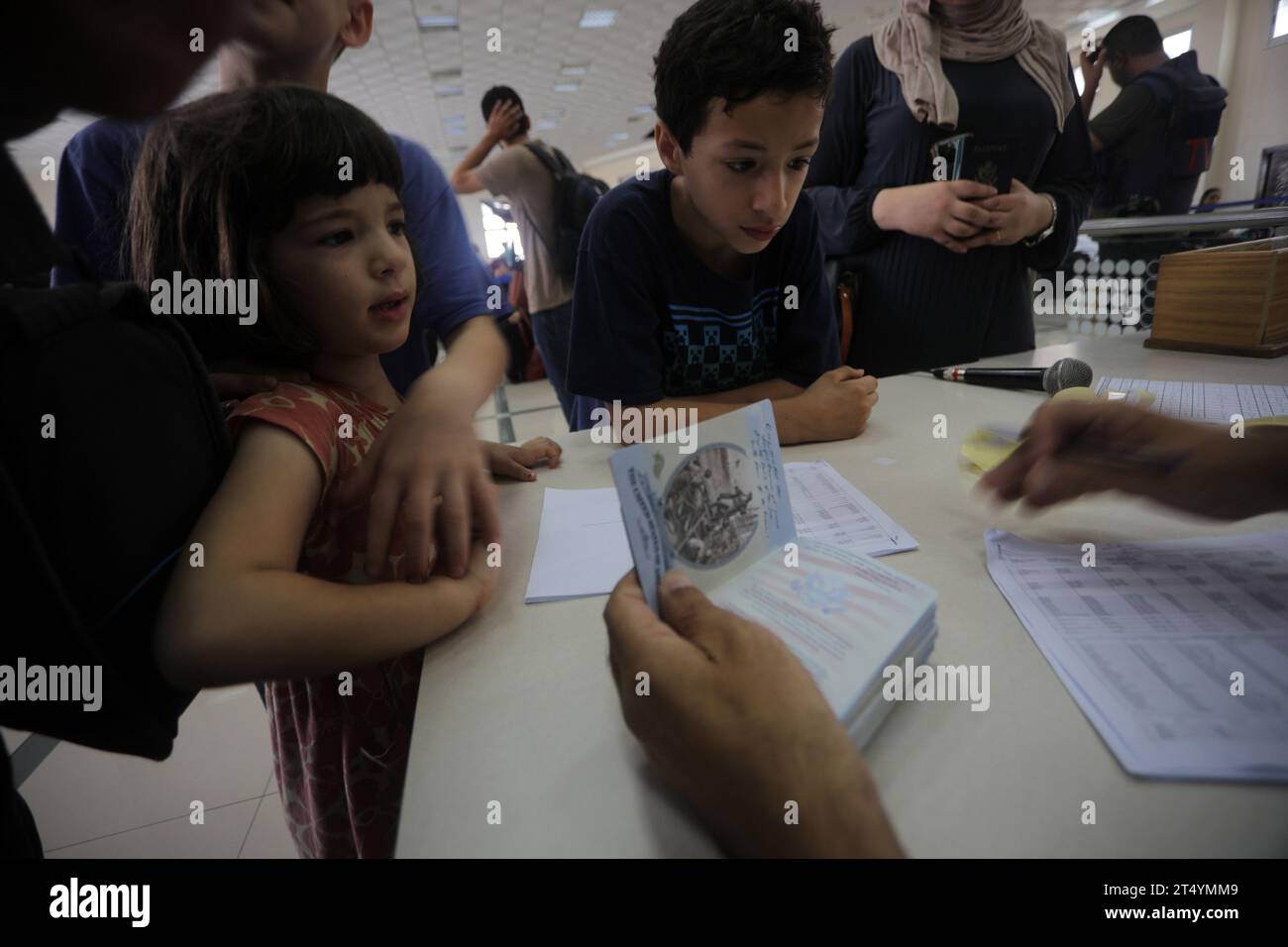 Rafah, Gaza. 01st Nov, 2023. A Palestinian security officer checks an ...