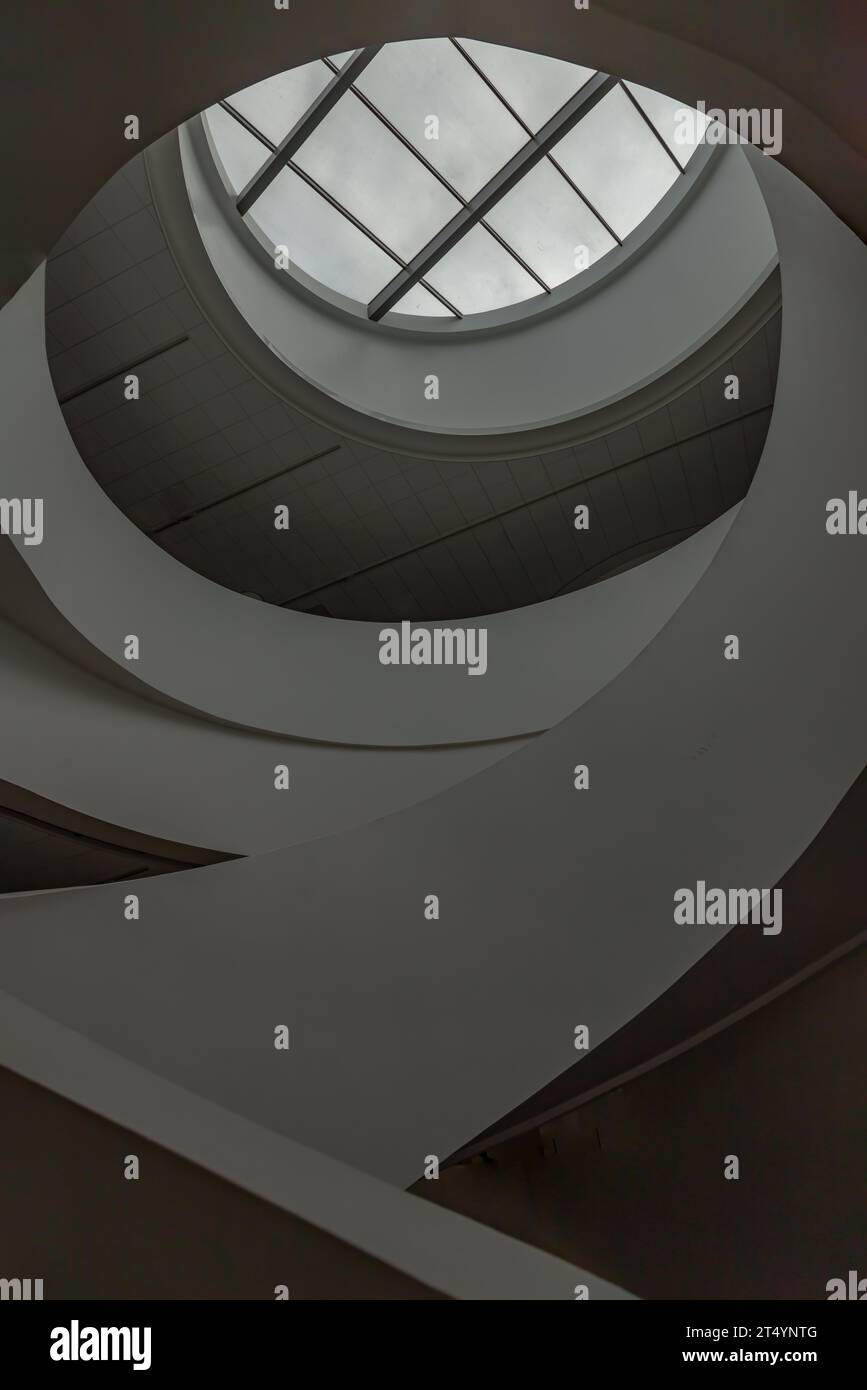 Looking up to the sky through modern channel round circular ceiling ...