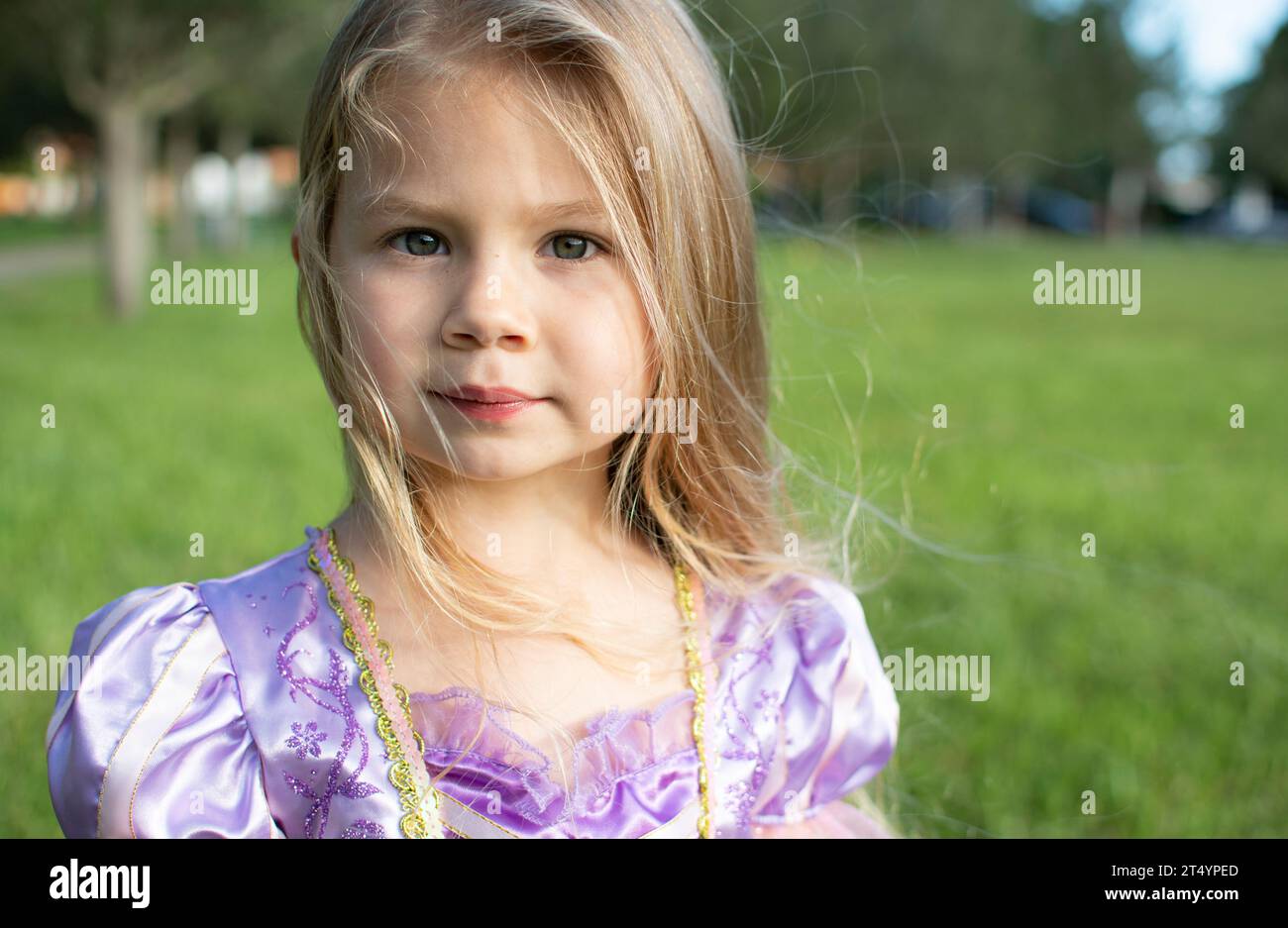Portrait of a Little girl with blonde hair thinking about something ... Portrait of a Little girl with blonde hair thinking about something ...