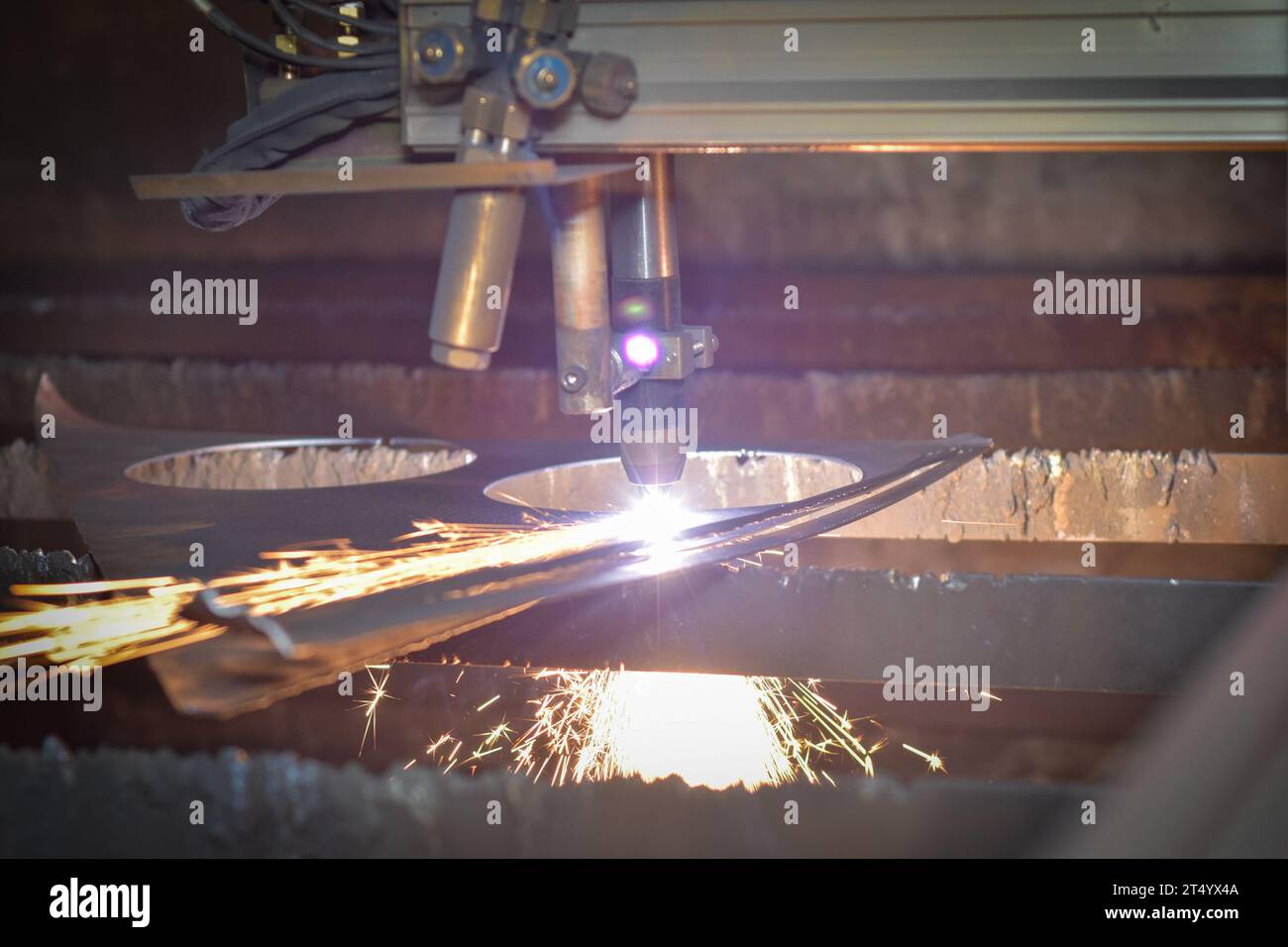 Laser metall cut cnc machine. Fly fire sparks background, Kocani ...