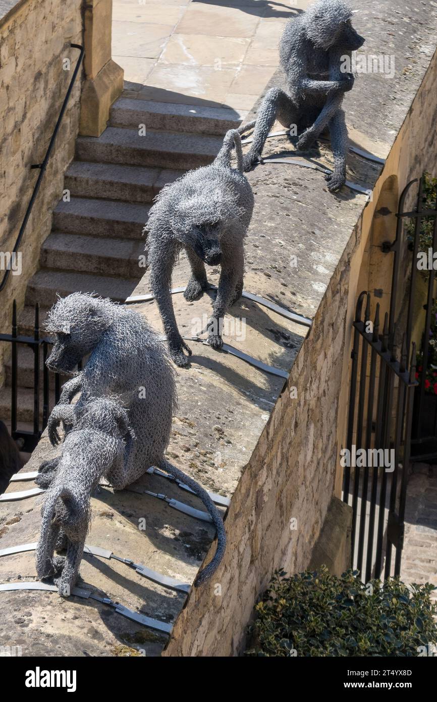 Sculpture of threemonkeys made of metal wire on the ramparts of the ...