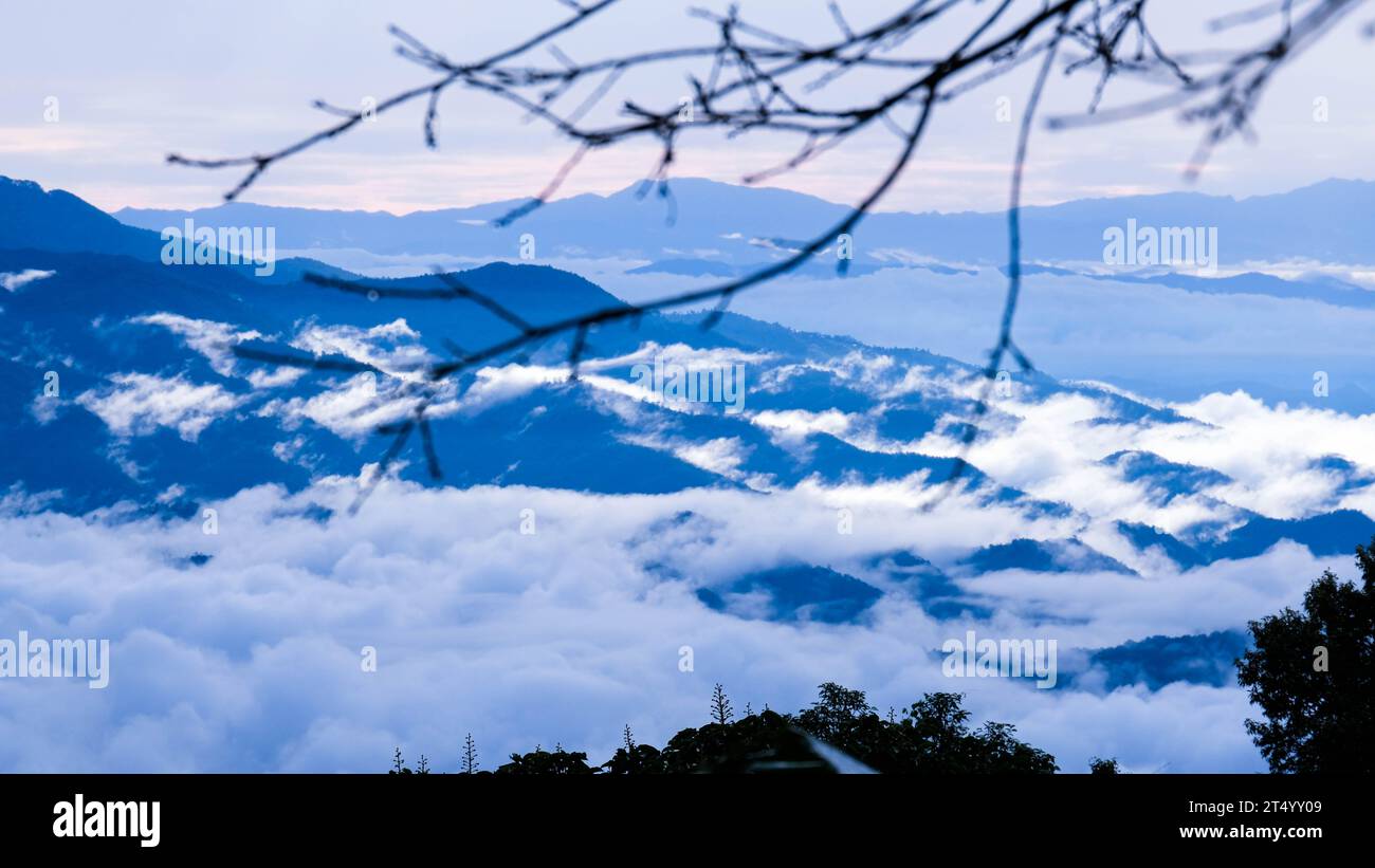 Aerial view over the mountains with sea of fog during morning sunrise ...
