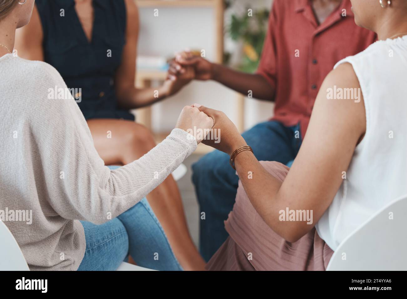 Trust, community and group of people holding hands in therapy ...