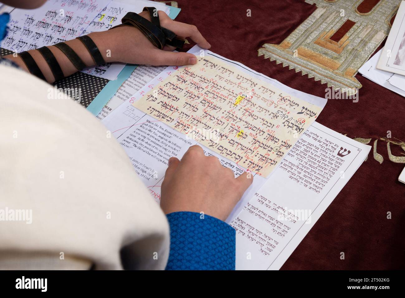 A man recites the Shema Yisrael Hebrew prayer during the Jewish morning ...