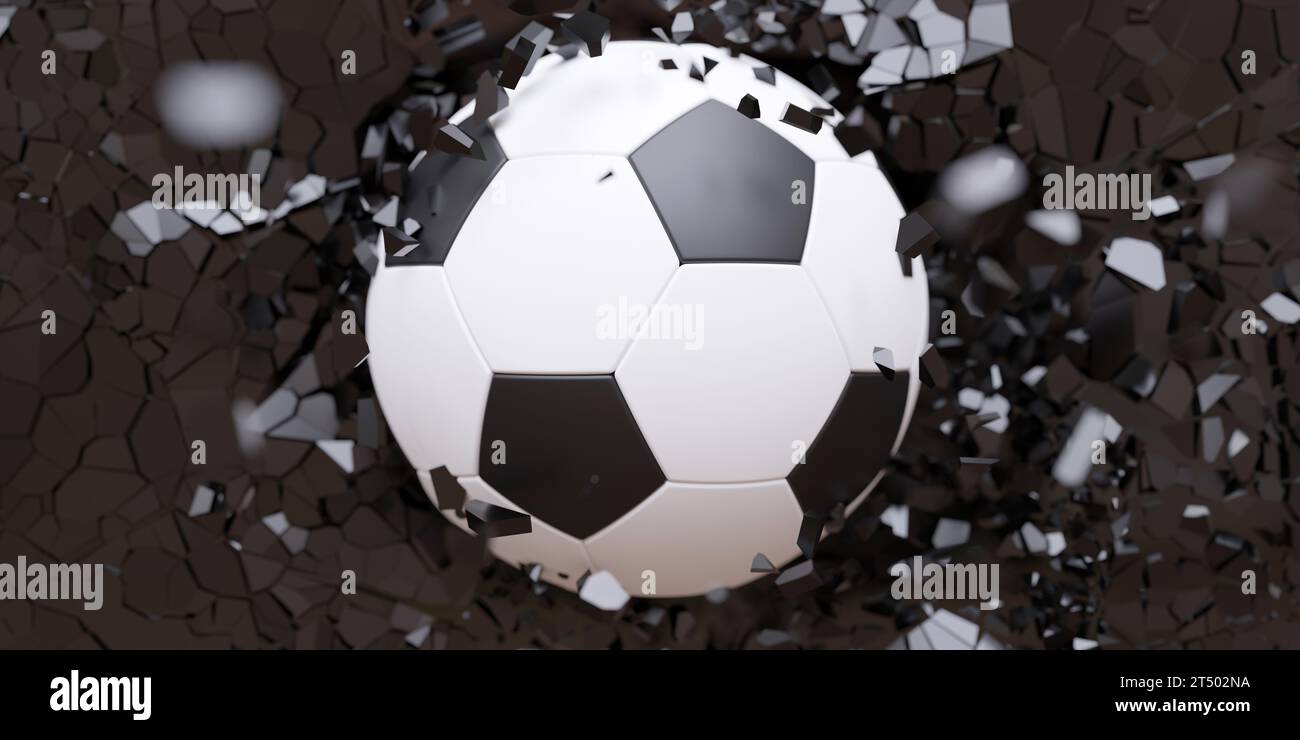 Soccer, football ball breaks with great force a black wall background ...