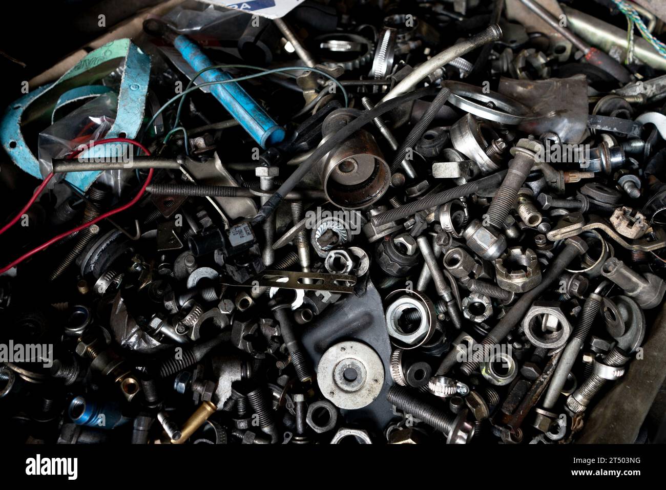 A pile of old spare parts in a garage Stock Photo - Alamy
