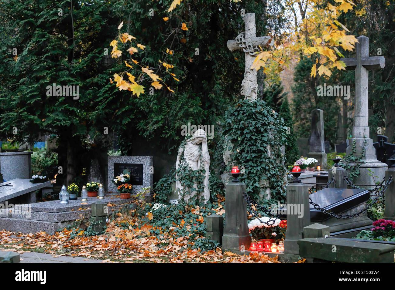 Warsaw, Poland. 1st Nov, 2023. Old tombstone sculpture, crosses and ...