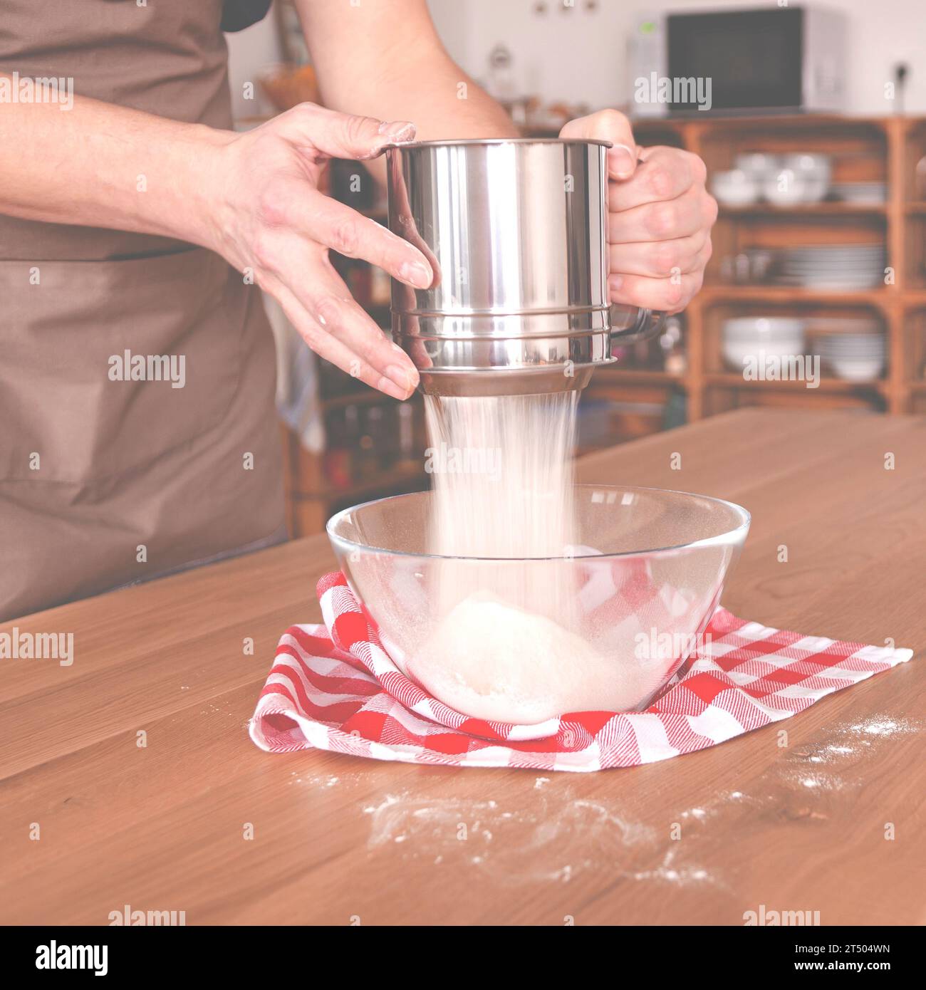 Bakery man sifting wheat hi-res stock photography and images - Alamy
