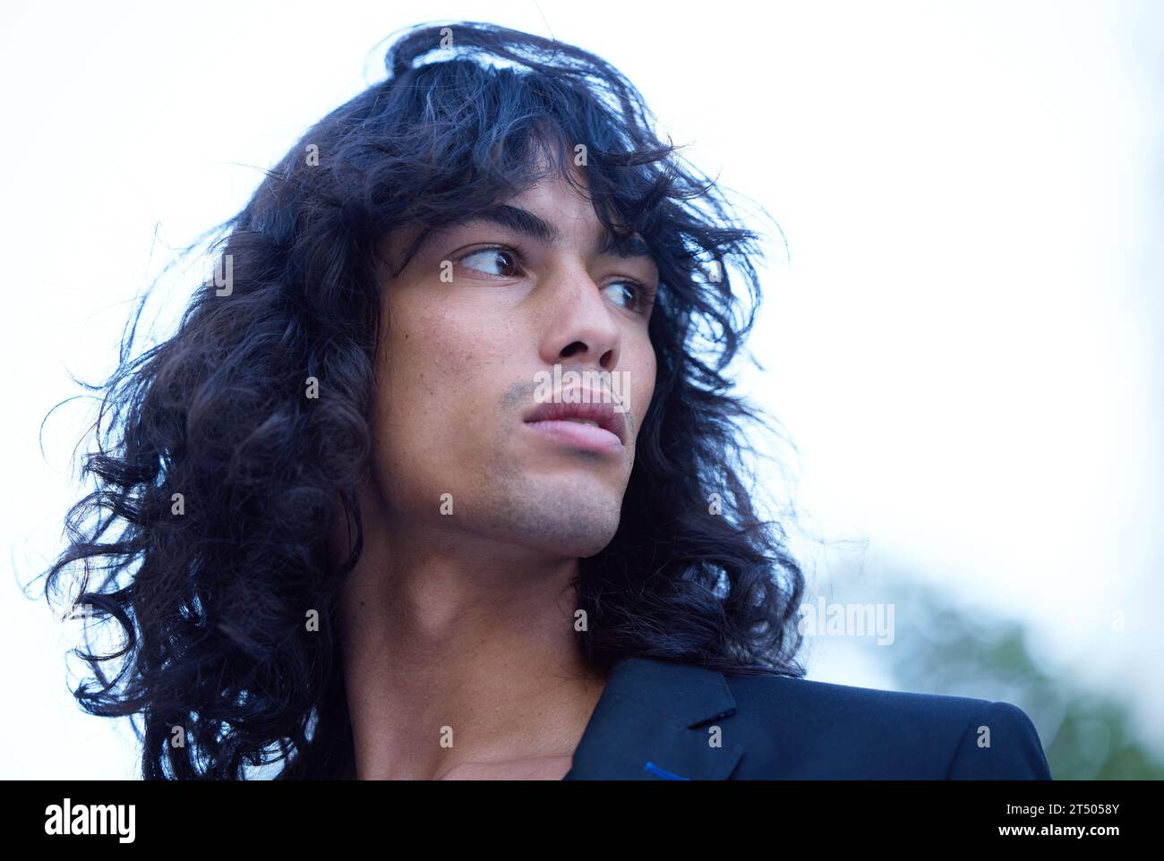 Thinking, student and man in a city with an idea, vision and goal for ...