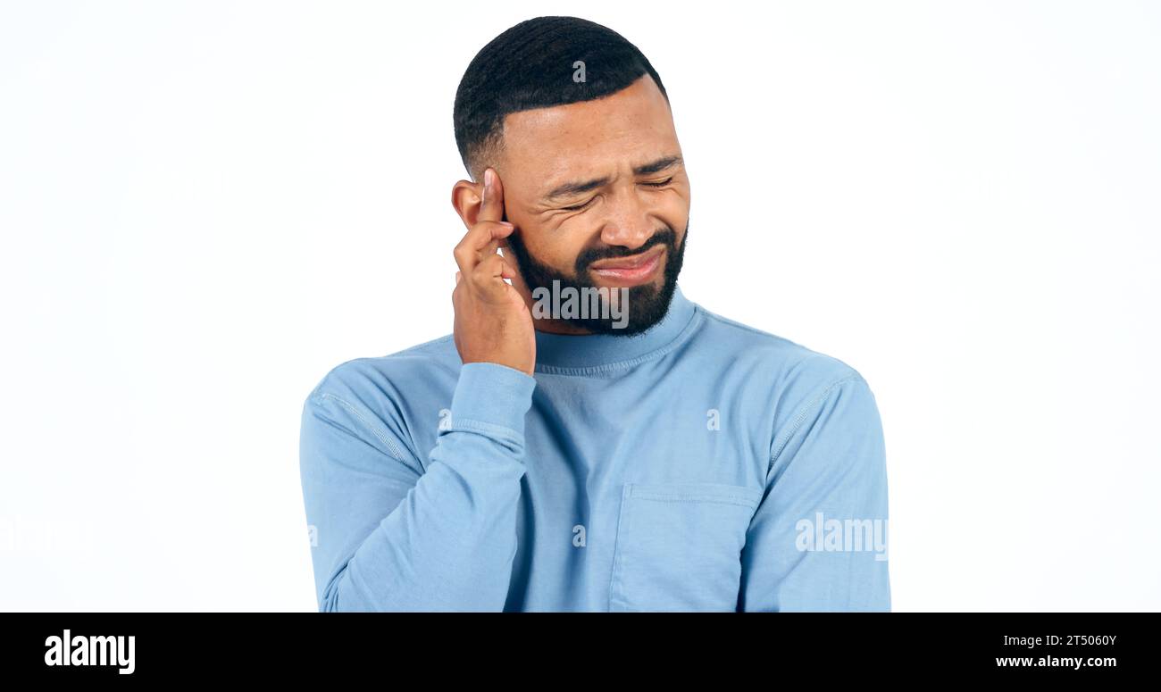 Stress, headache and man in studio with pain, pressure or vertigo on ...