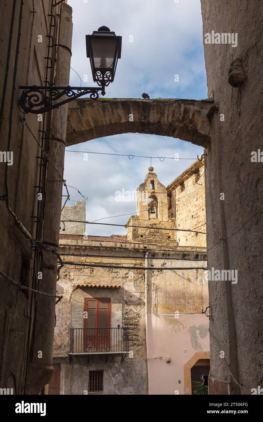 Palermo, Sicily, 2016. A vintage lamp post in an old alleyway opening ...