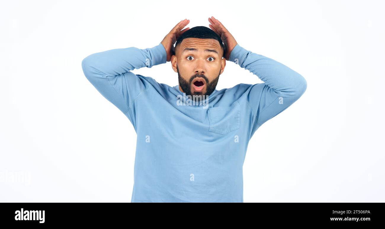 Shock, emoji and portrait of man in a studio with wow, omg or wtf ...