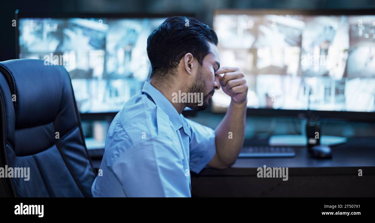 Tired security guard, cctv screen and stress headache from late shift ...