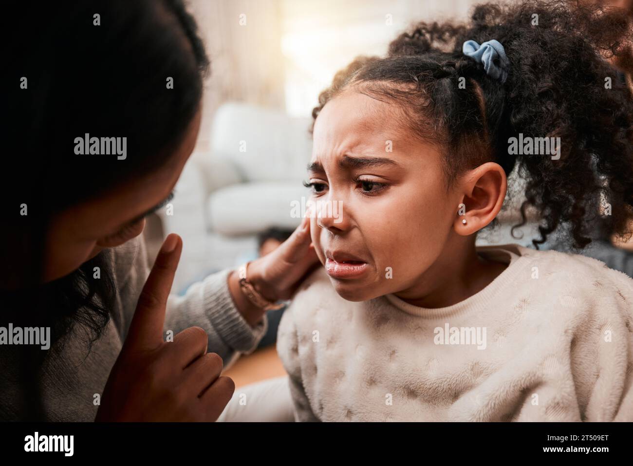 Discipline, angry and mother with girl, home and unhappy with ...