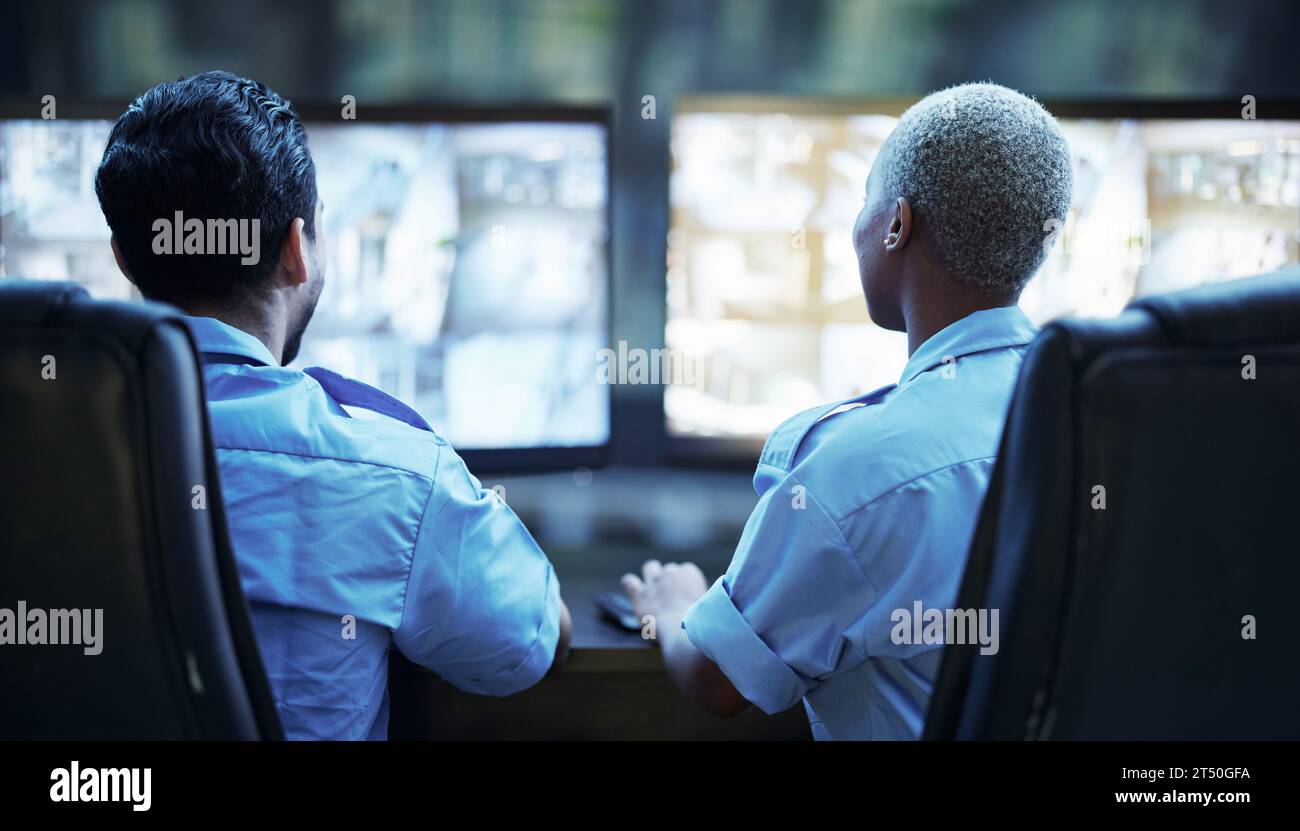 Security guard in control room, team checking screen of cctv computer ...
