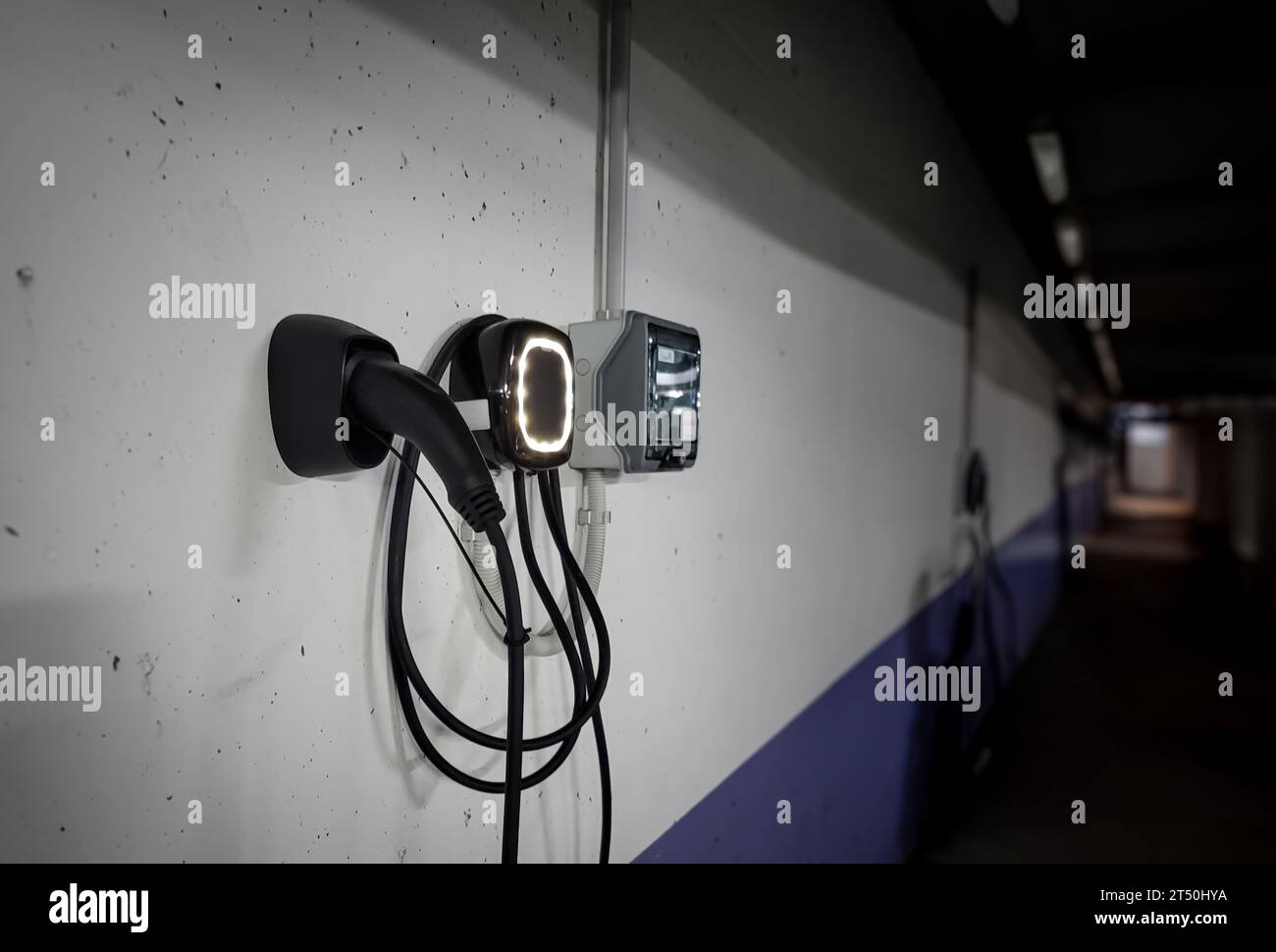 Installing electric vehicle charger hi-res stock photography and images ...