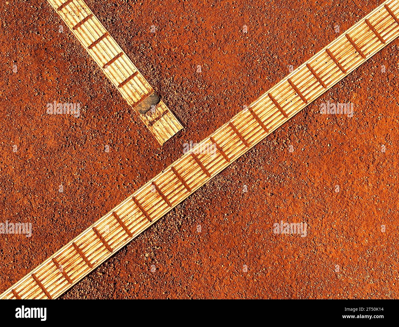 Top view of clay tennis court corner with white lines cross ...