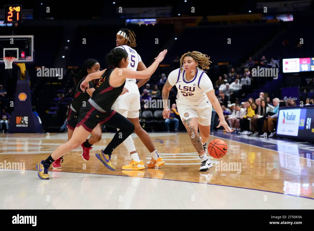 LSU guard Kateri Poole (55) moves the ball down court against Loyola ...