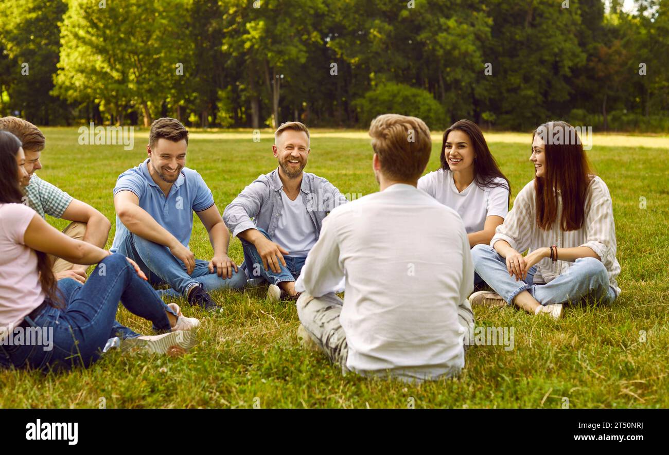 Female friends relaxing on park hi-res stock photography and images - Alamy